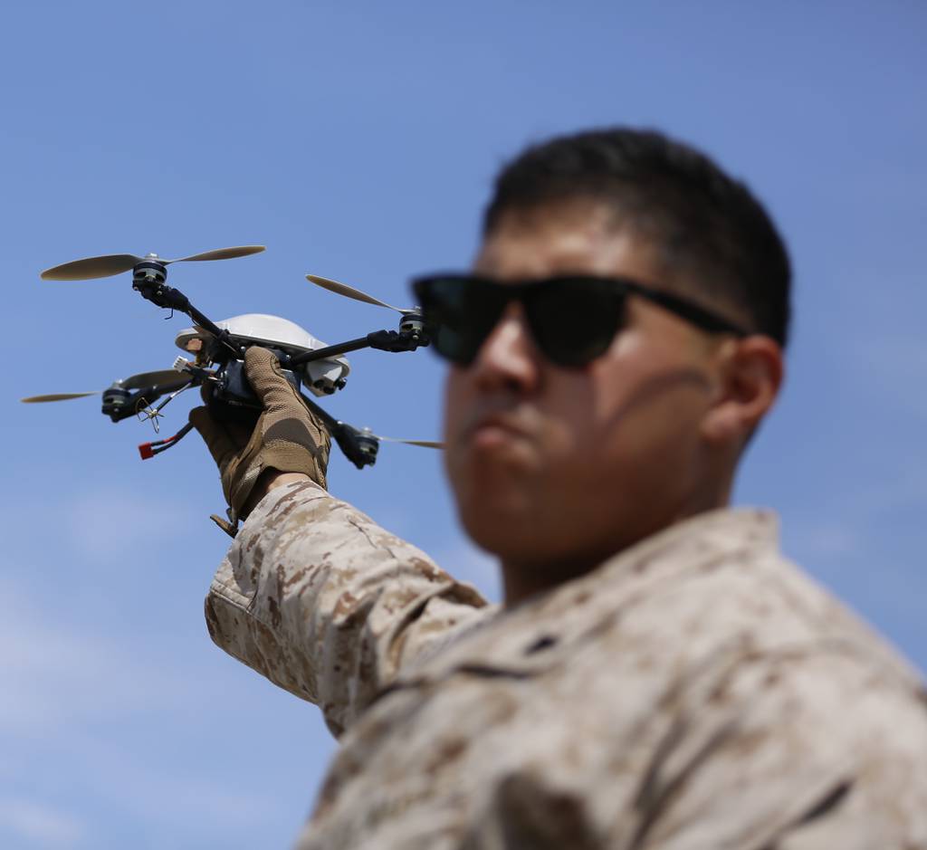 West Coast Marine grunts test armed self-driving tanks, tiny drones and ...