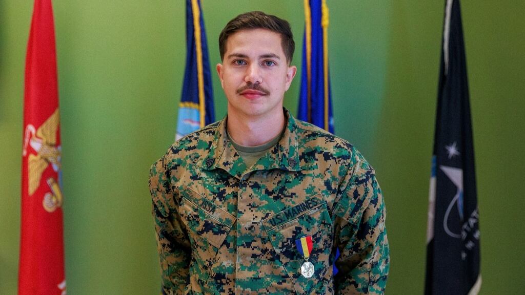 Marine receives rare heroism award for saving victim shot 23 times